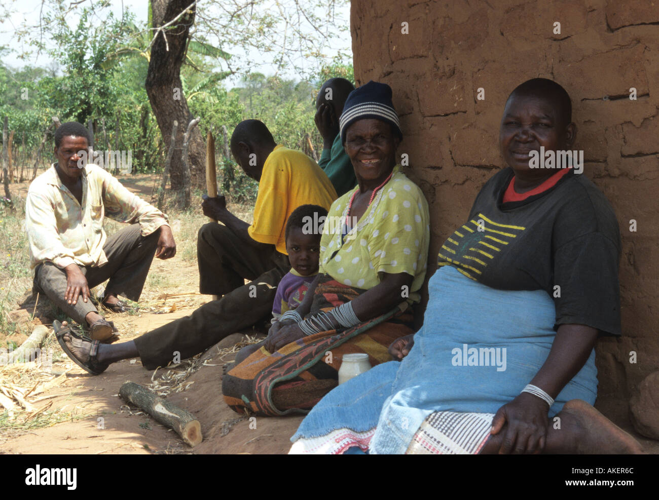A group of people spend the afternoon outside their house in Kwa zulu ...