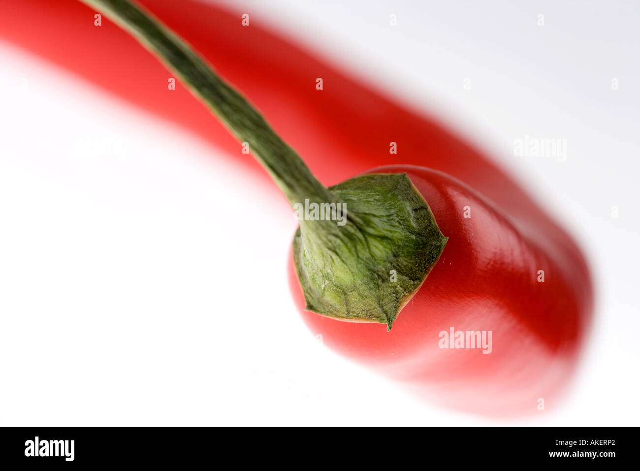 Hot red chilli sliced to show seeds Stock Photo - Alamy