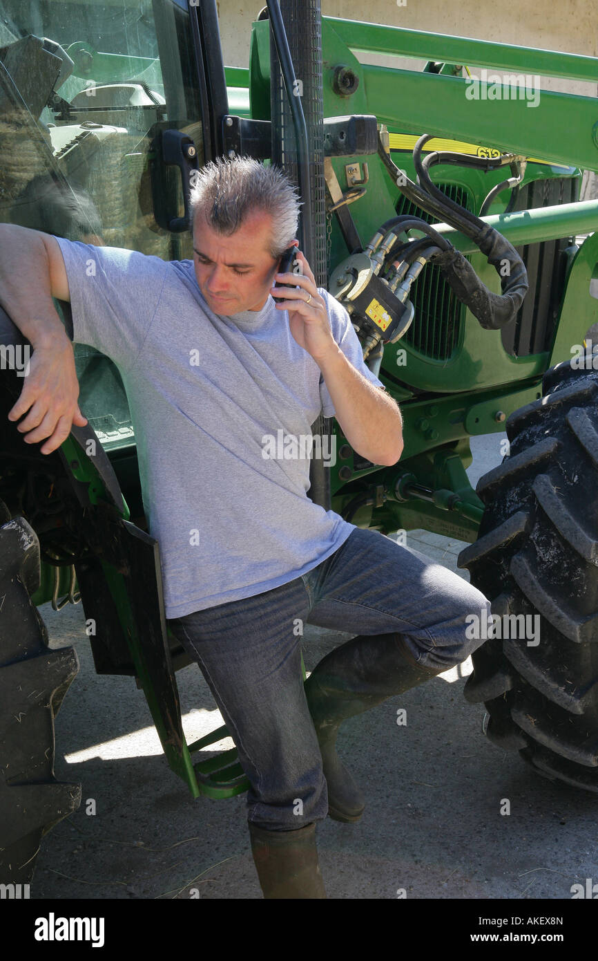 farmer with mobile phone Stock Photo - Alamy