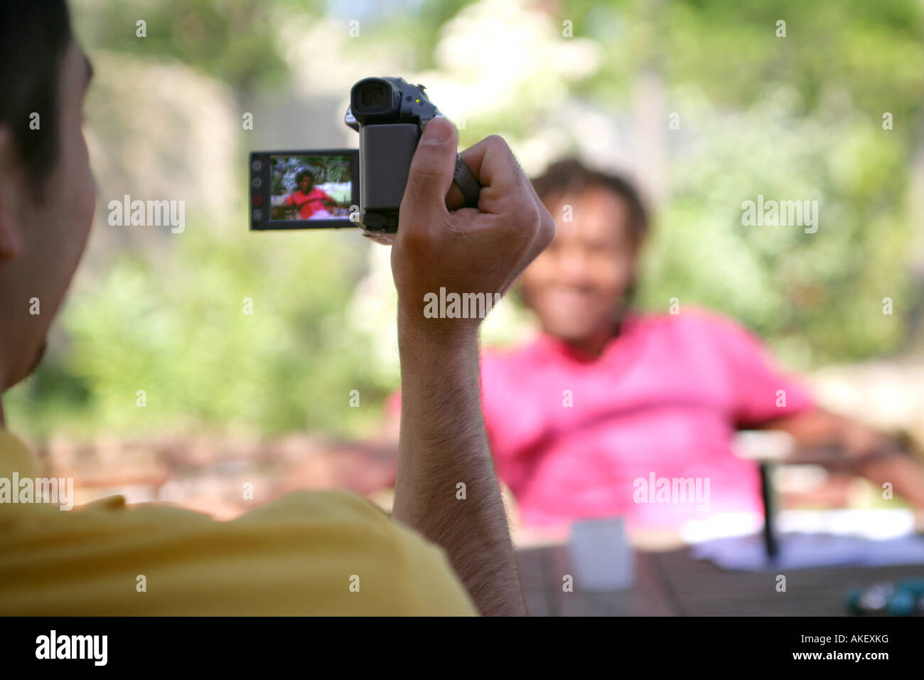 Back view of a man and video camera hi-res stock photography and images ...