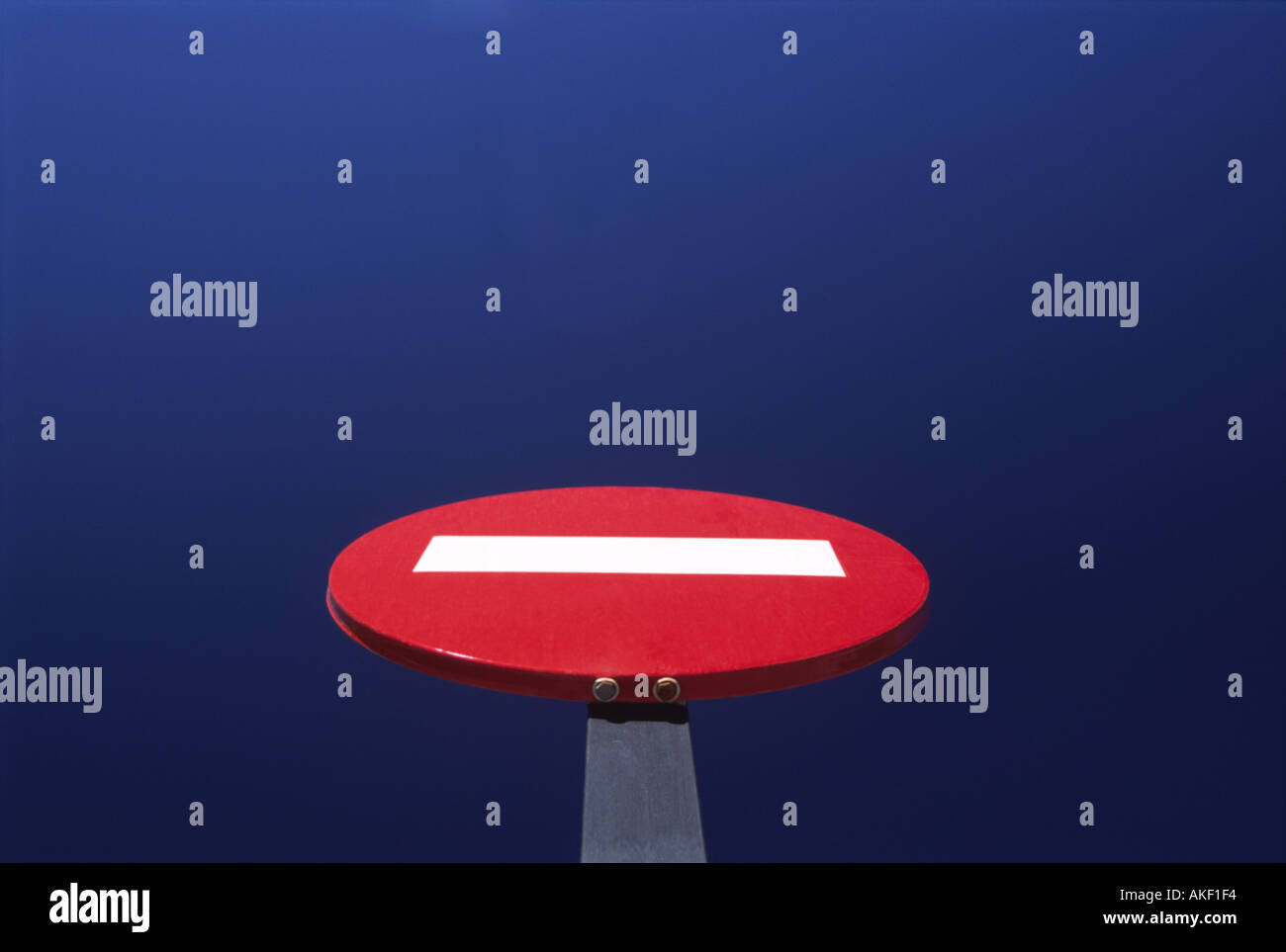 stop sign on road in spain warning you of no entry Stock Photo - Alamy