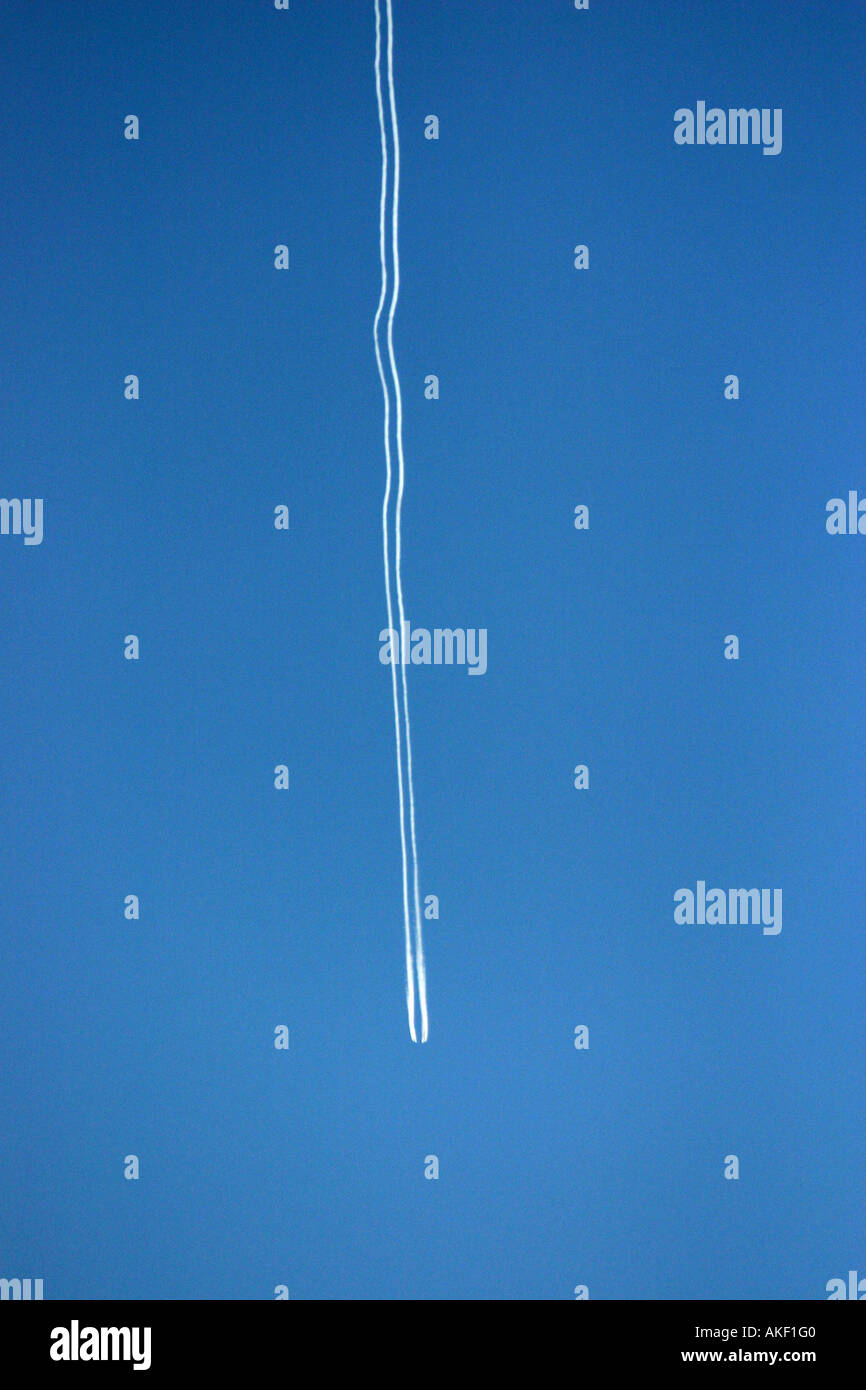 Airplane trail over the sky Stock Photo - Alamy