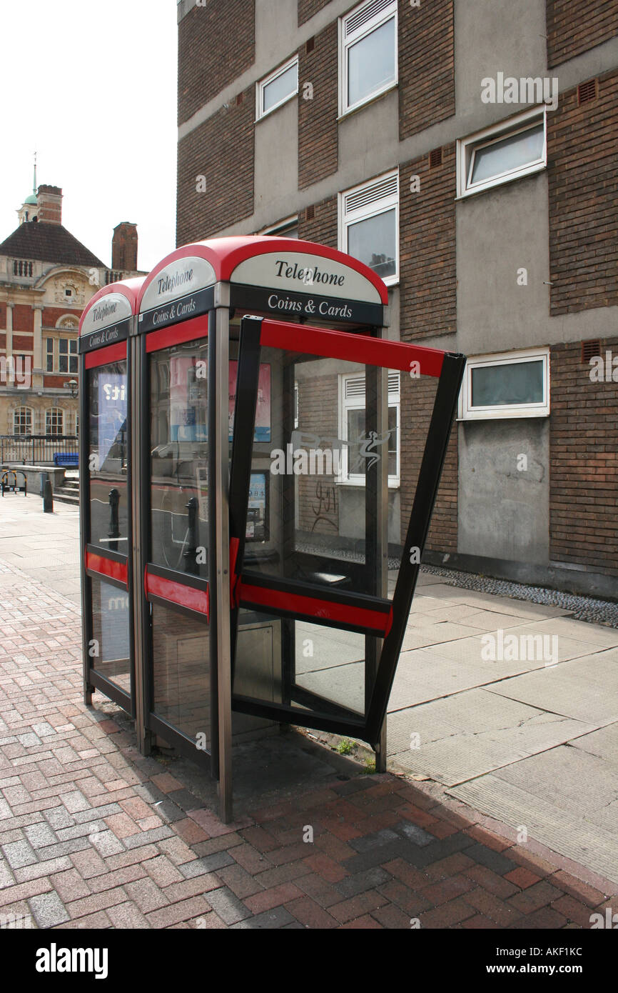 Broken Telephone box door Stock Photo - Alamy