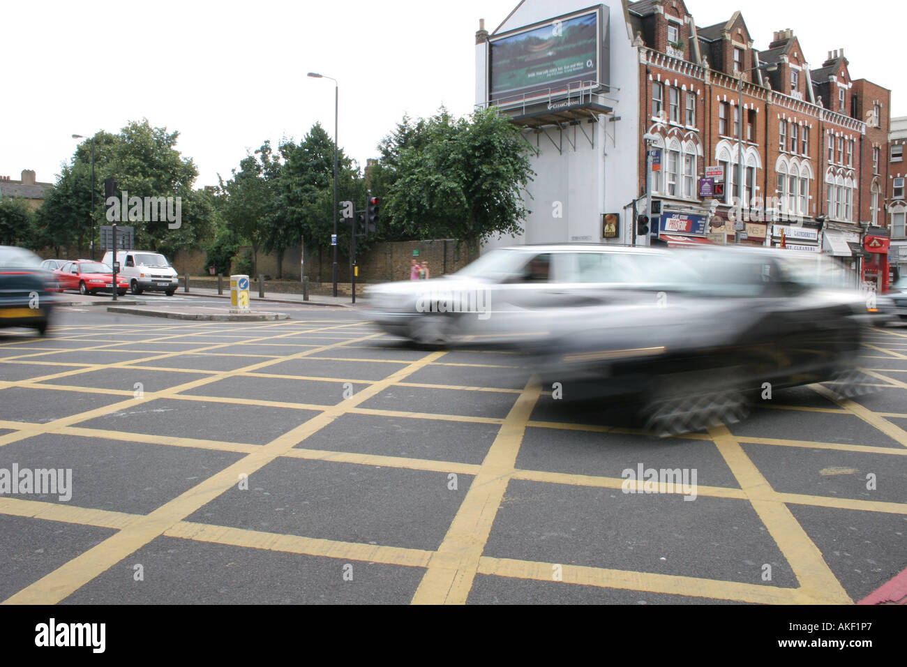 Cars on a crossing road Stock Photo - Alamy
