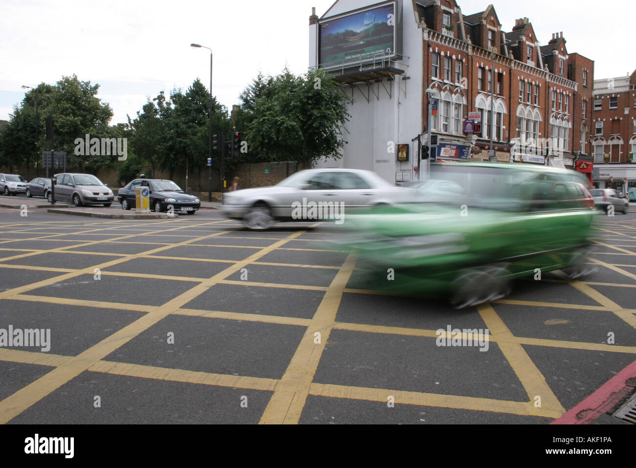 Cars on a crossing road Stock Photo - Alamy