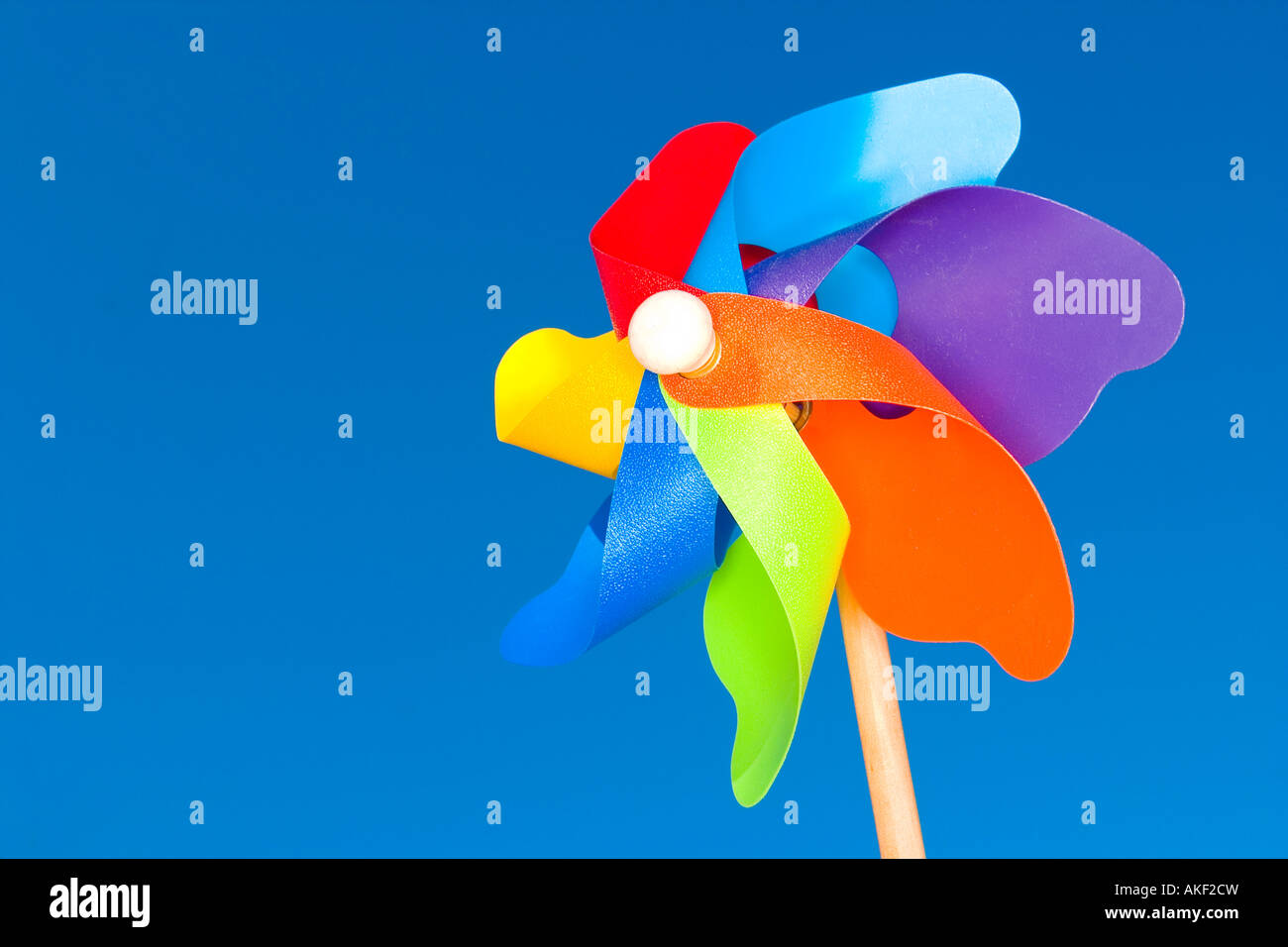A stock Photograph of a colorful windmill toy Stock Photo - Alamy