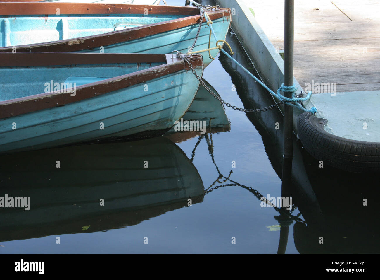 Boats resting at dock Stock Photo - Alamy