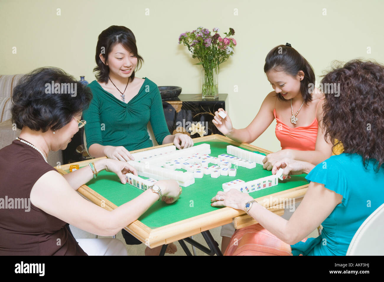 Two women playing mahjong hi-res stock photography and images - Alamy