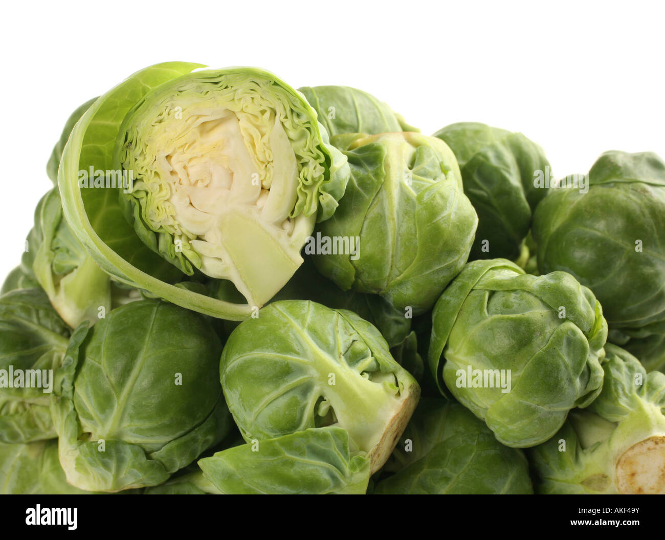 Small cabbage detail isolated on white background Stock Photo - Alamy