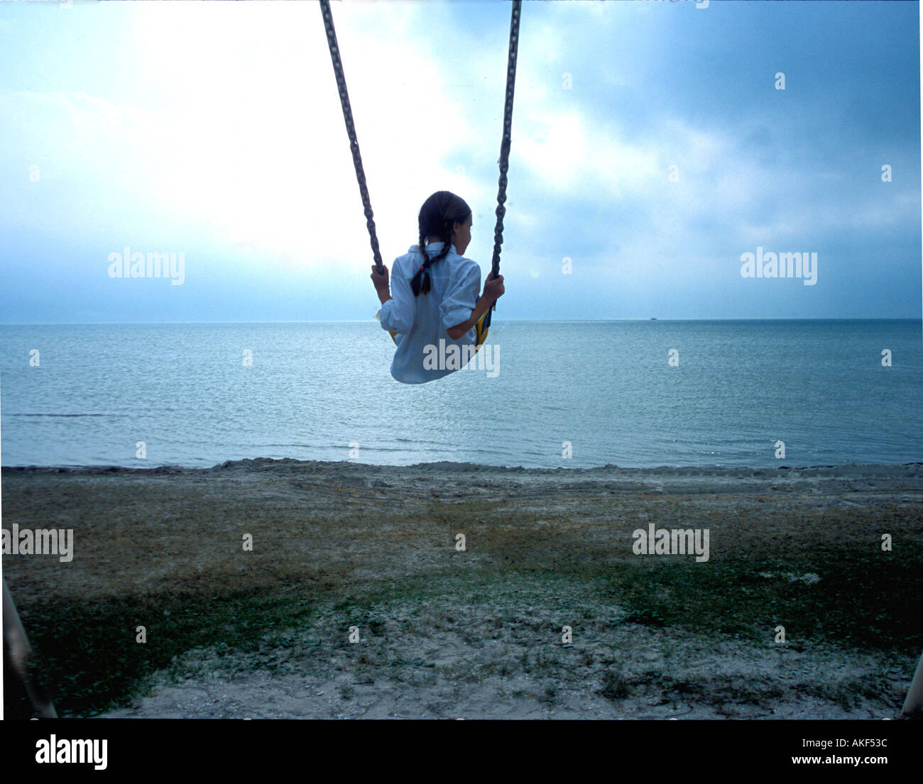 Swing set at the beach on Gulf Of Mexico Stock Photo - Alamy