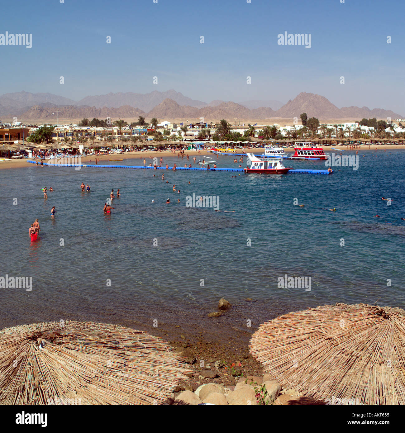 Beach umbrellas sea african people hi-res stock photography and images ...