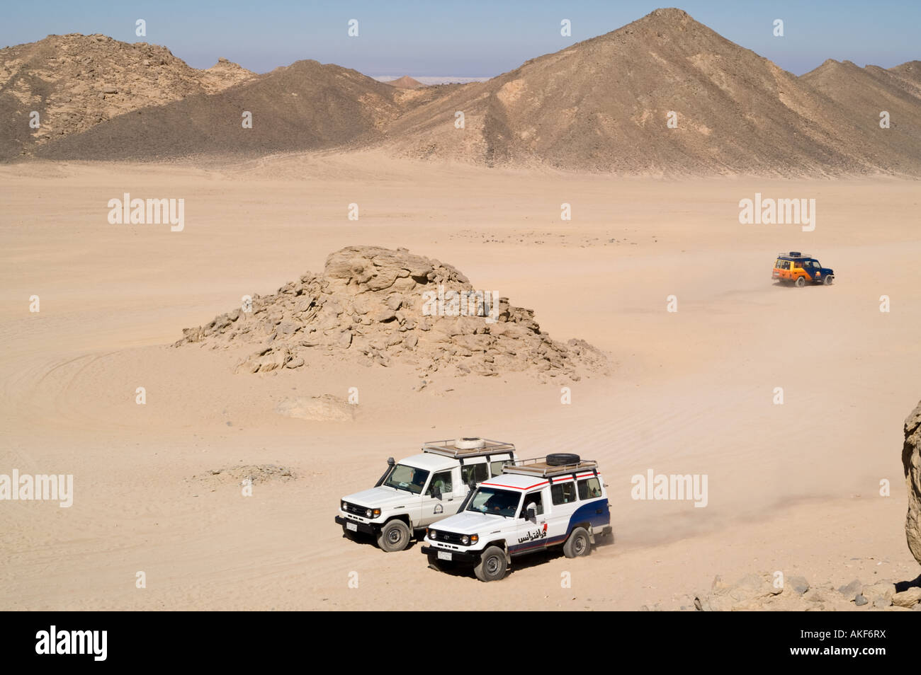 two trucks desert race Stock Photo - Alamy