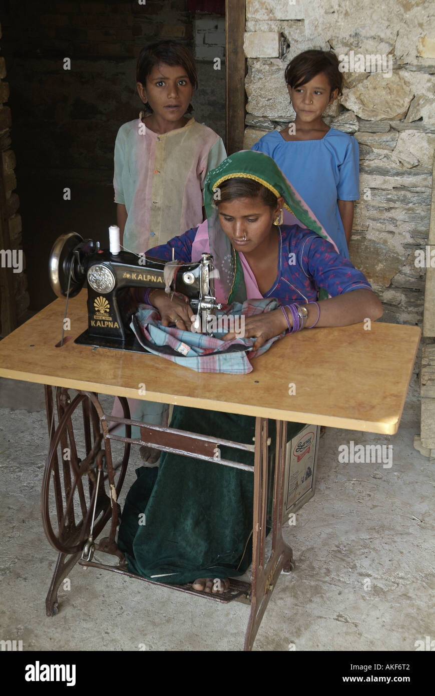 Indian tailor traditional sewing machine hi-res stock photography and ...