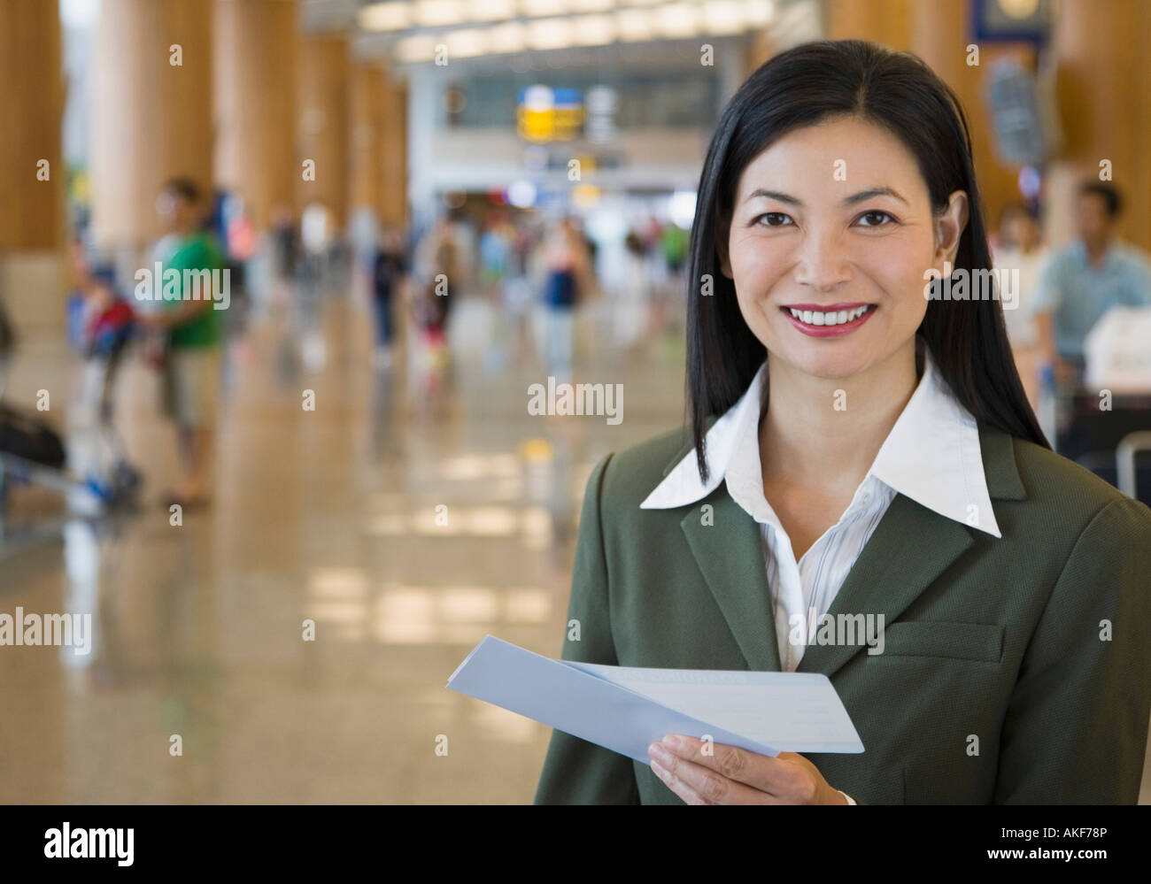Happy black woman holding a ticket hi-res stock photography and images ...
