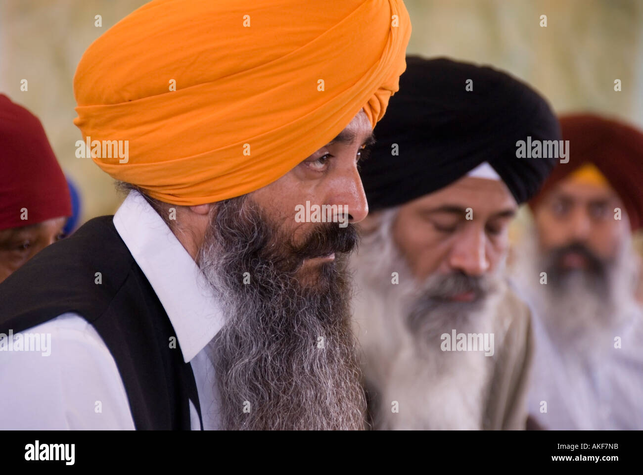 Sikh men taking part in prayers in a Sikh temple Stock Photo - Alamy