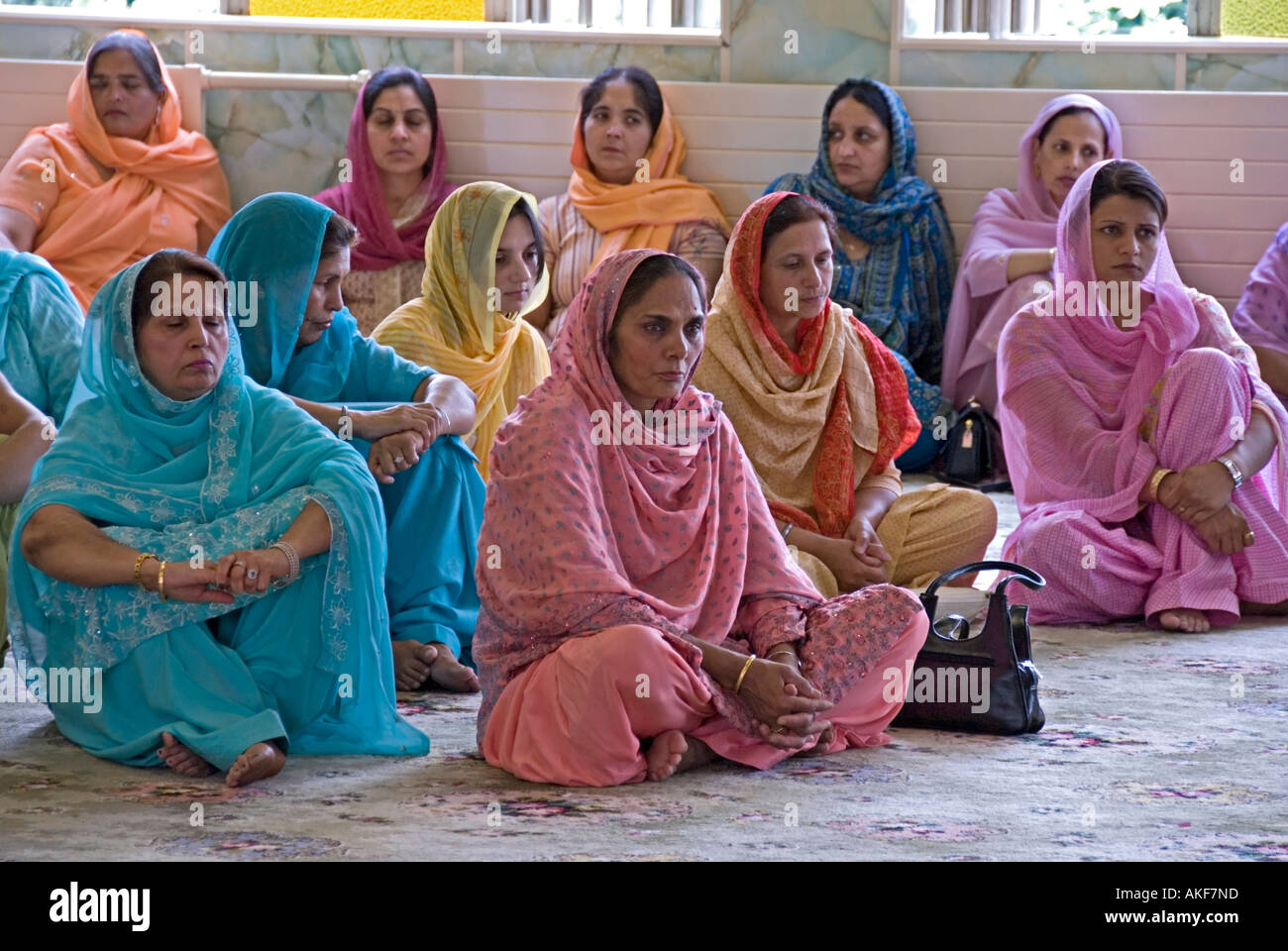 Sikh women taking part in prayers in a Sikh temple Stock Photo: 8561820 ...