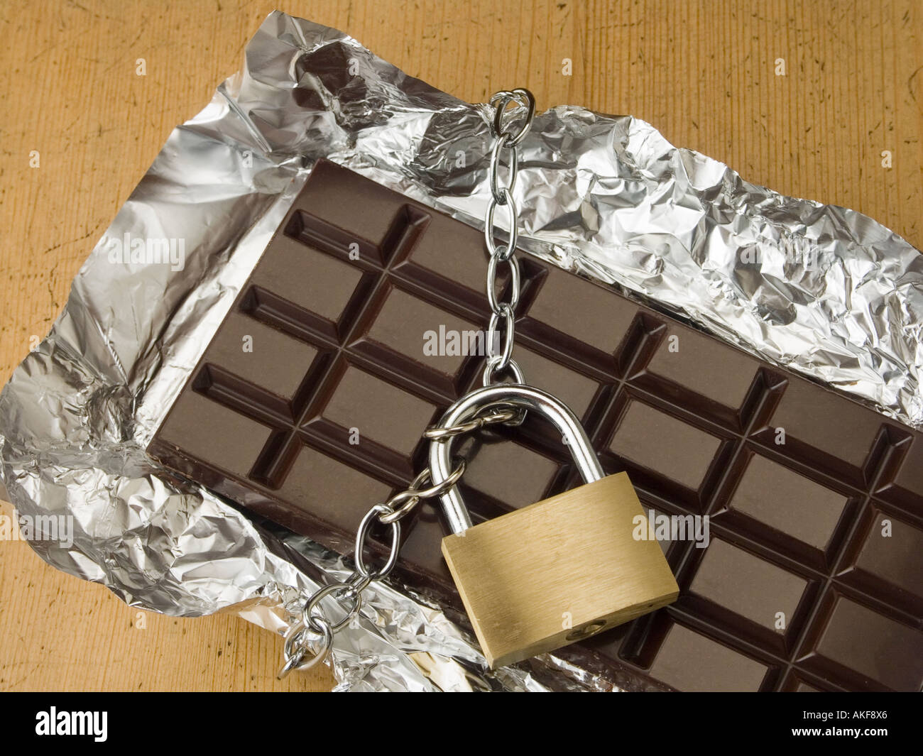 Chocolate bar with padlock Stock Photo - Alamy