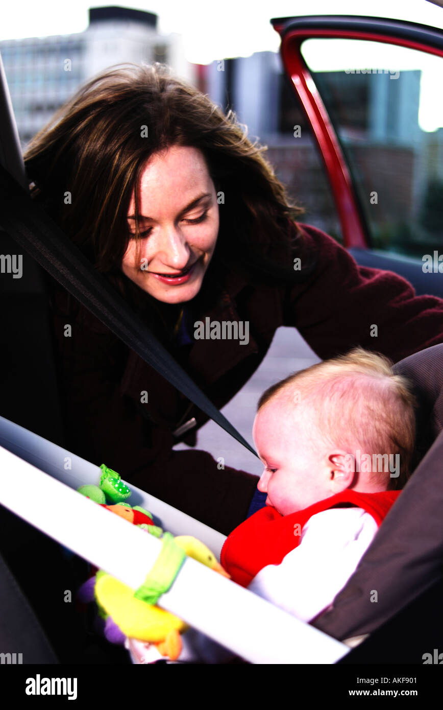 Putting baby in car hi-res stock photography and images - Alamy