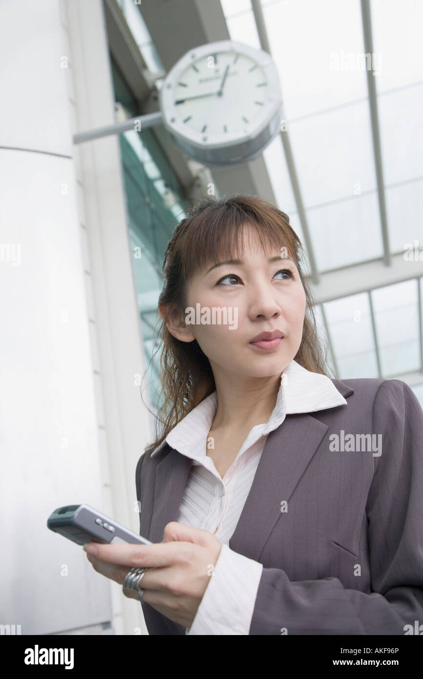 Woman waiting for phone to ring hi-res stock photography and images - Alamy