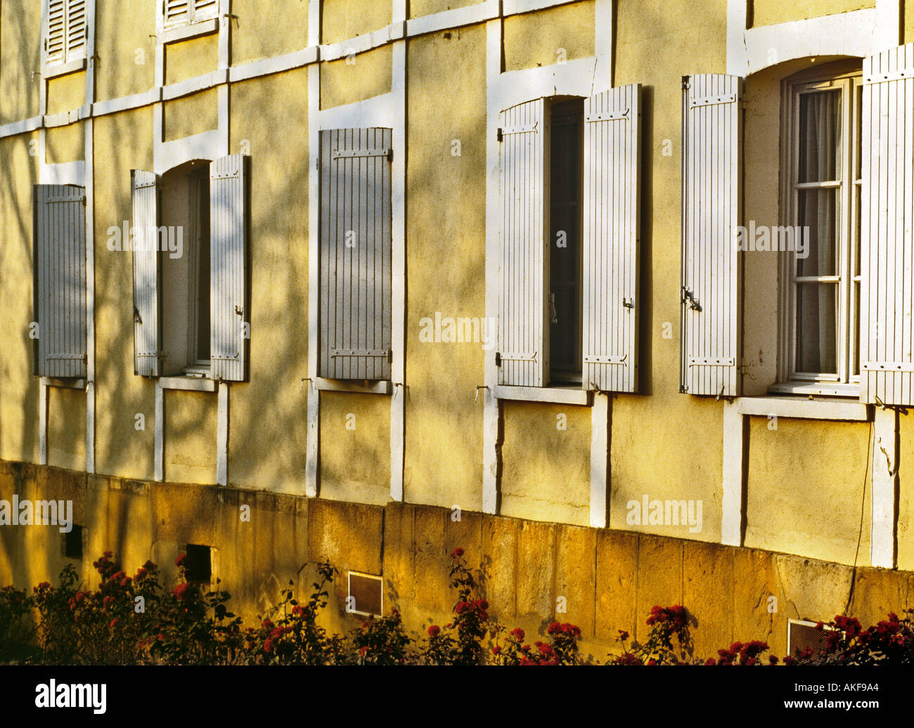Exterior of yellow building Stock Photo - Alamy