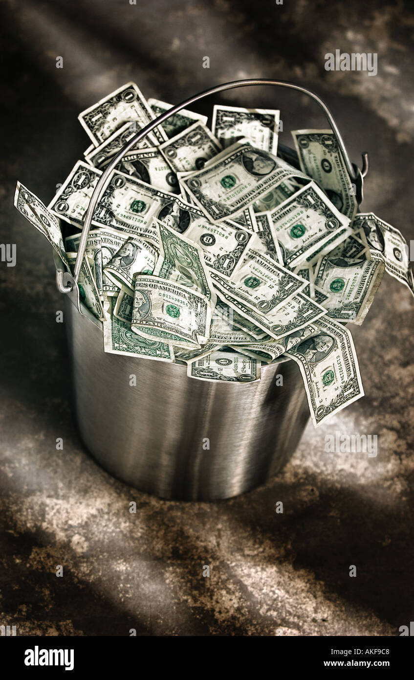Bucket of money hi-res stock photography and images - Alamy