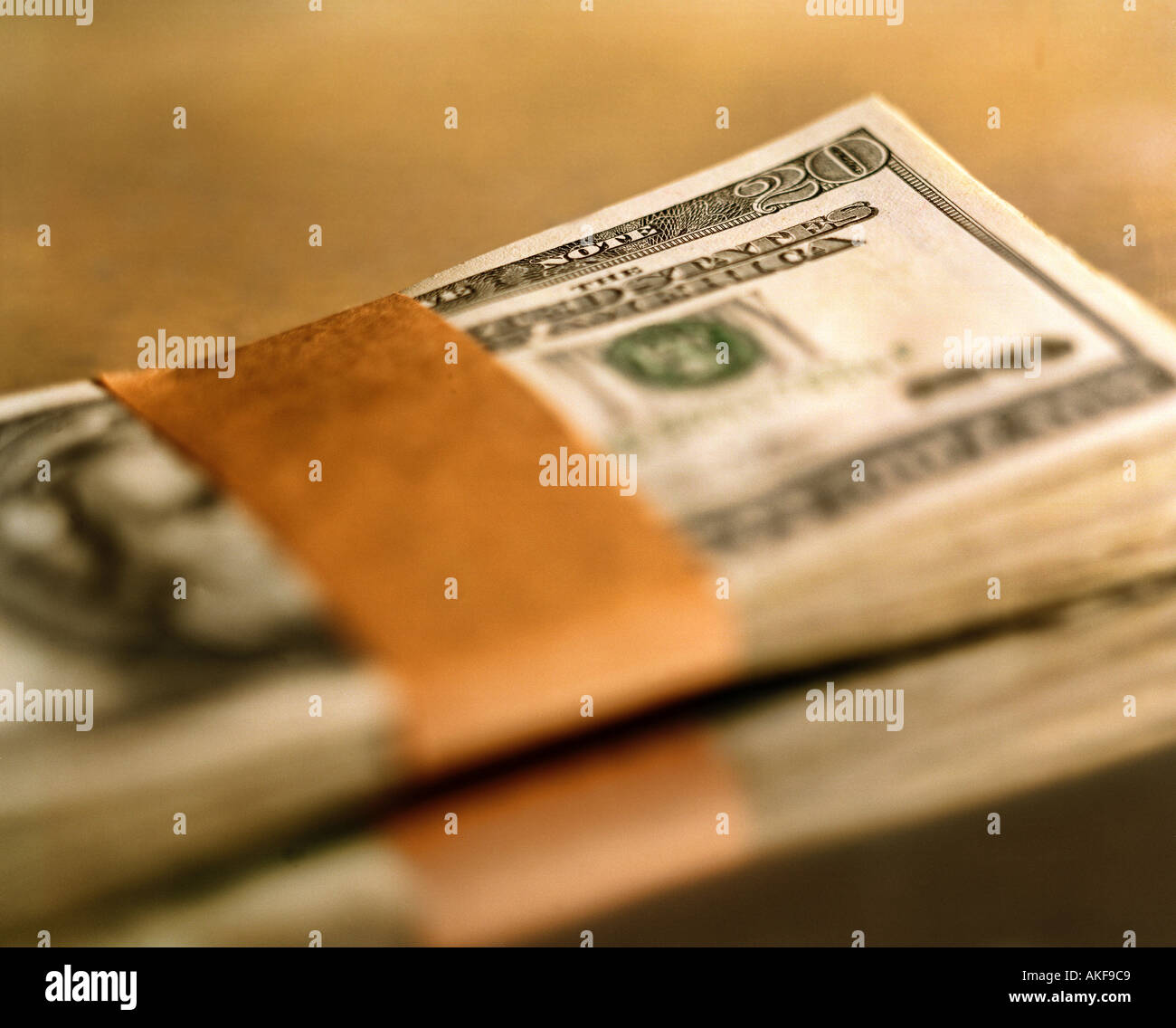 Wrapped stack of twenty dollar bills Stock Photo - Alamy