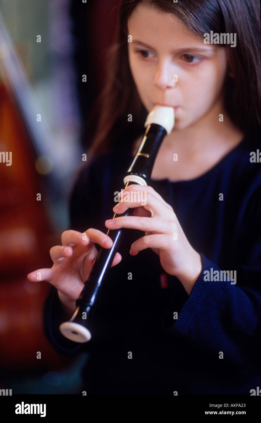 student playing recorder Stock Photo - Alamy