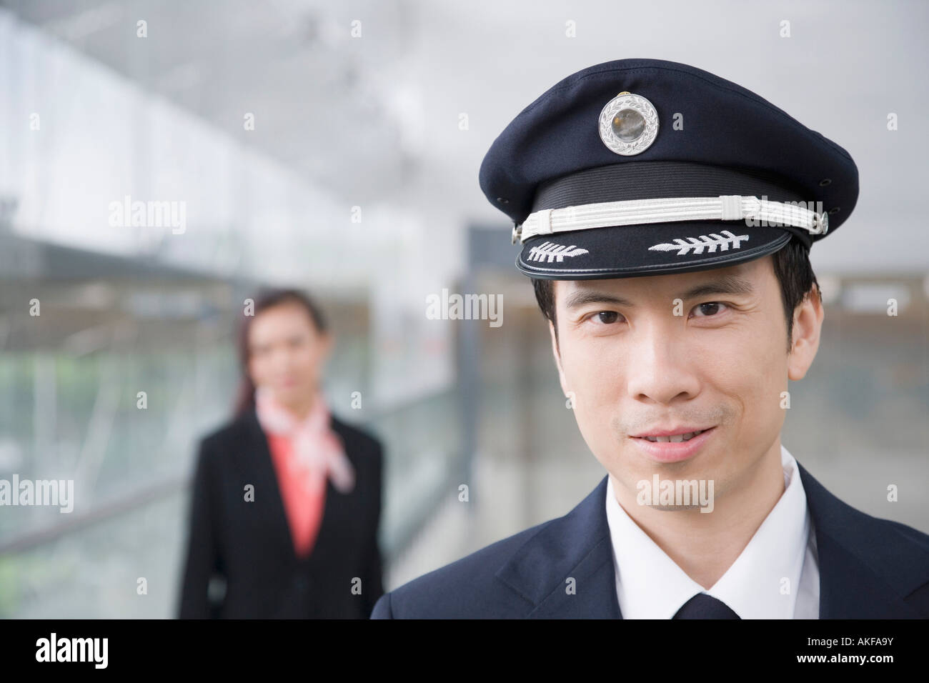Portrait of a male pilot smiling Stock Photo - Alamy
