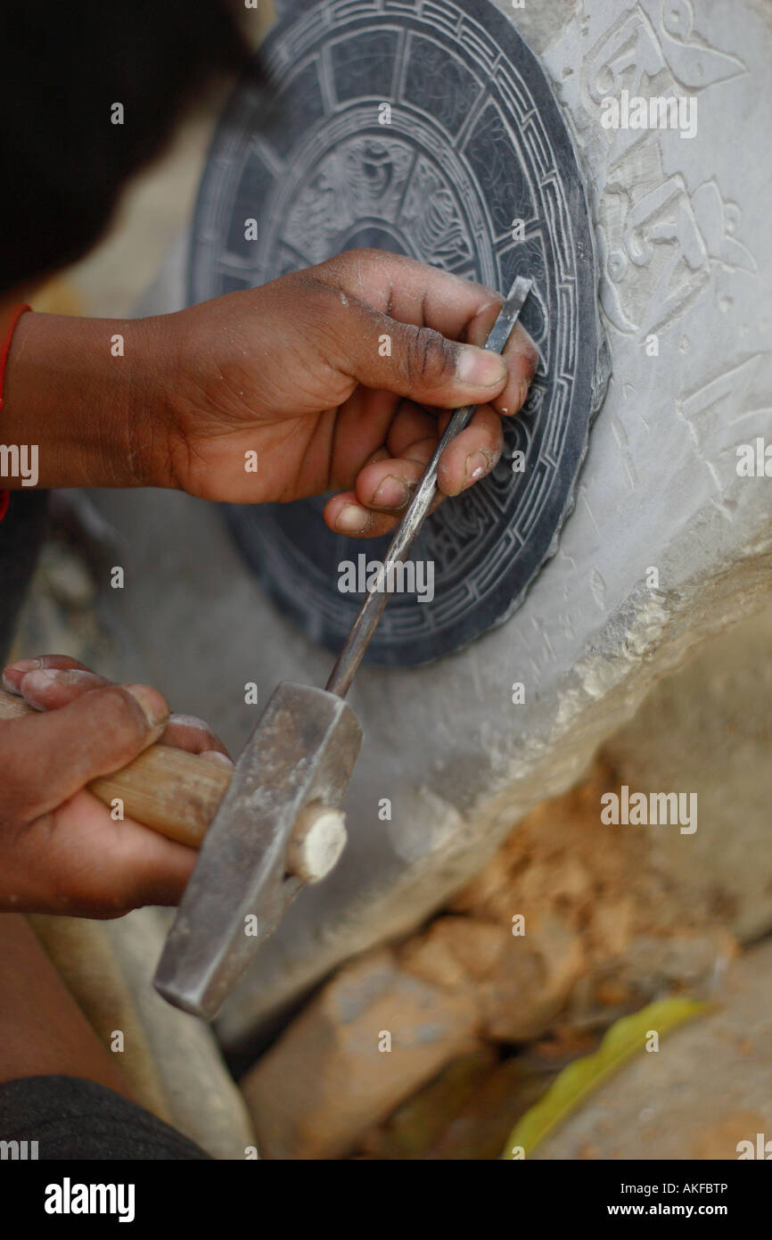 Tibetan stone carver hi-res stock photography and images - Alamy