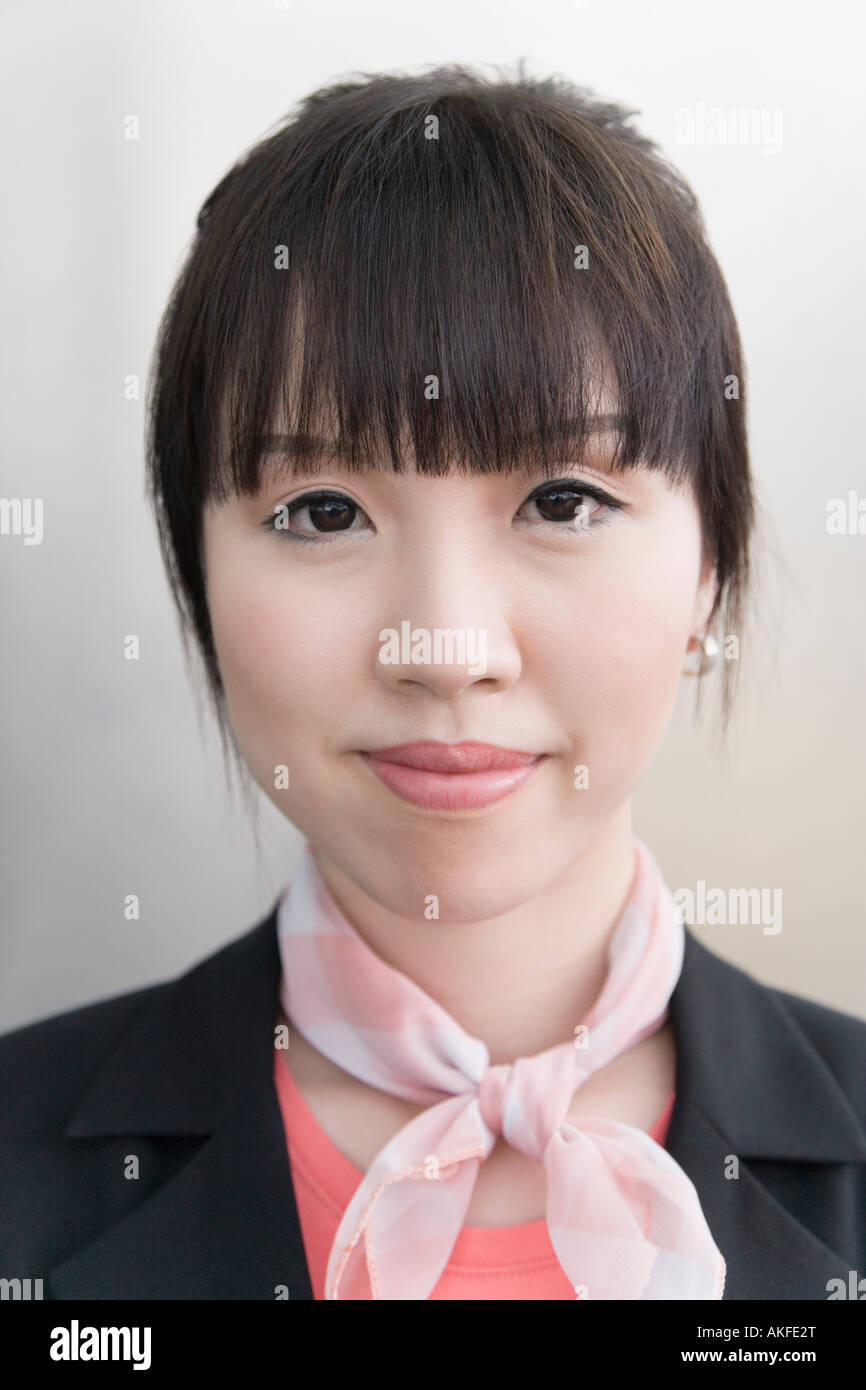 Portrait of a cabin crew smiling Stock Photo - Alamy