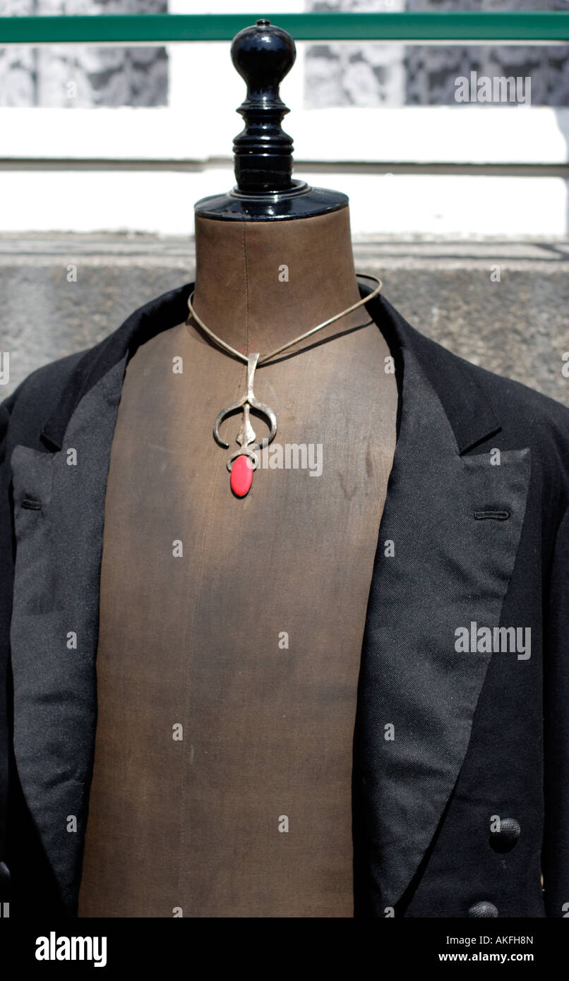 Taylors dummy wearing tails and pendant necklace at a French street ...