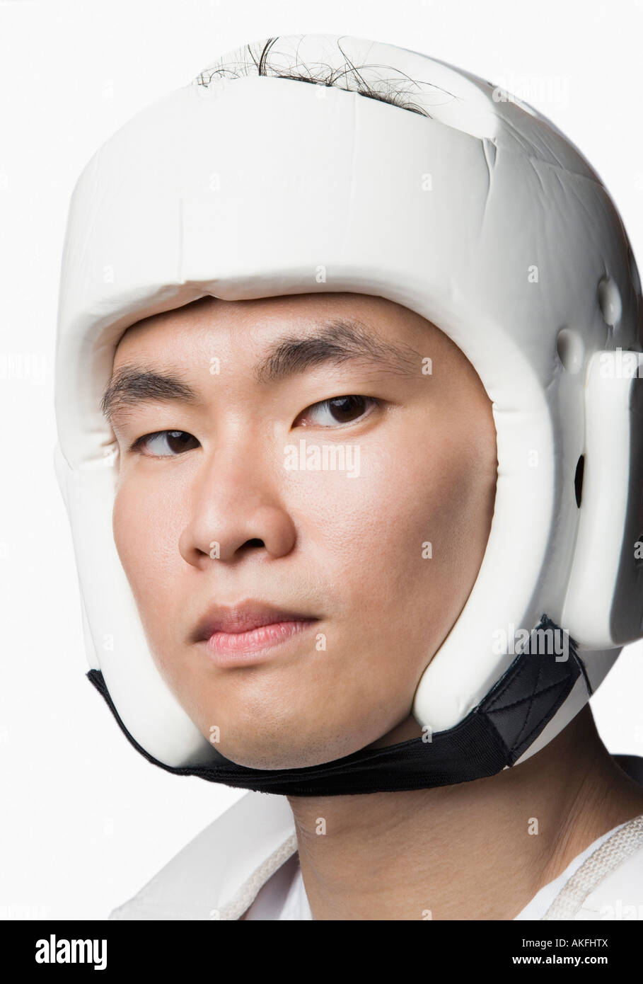 Portrait of a young man wearing a sports helmet Stock Photo - Alamy