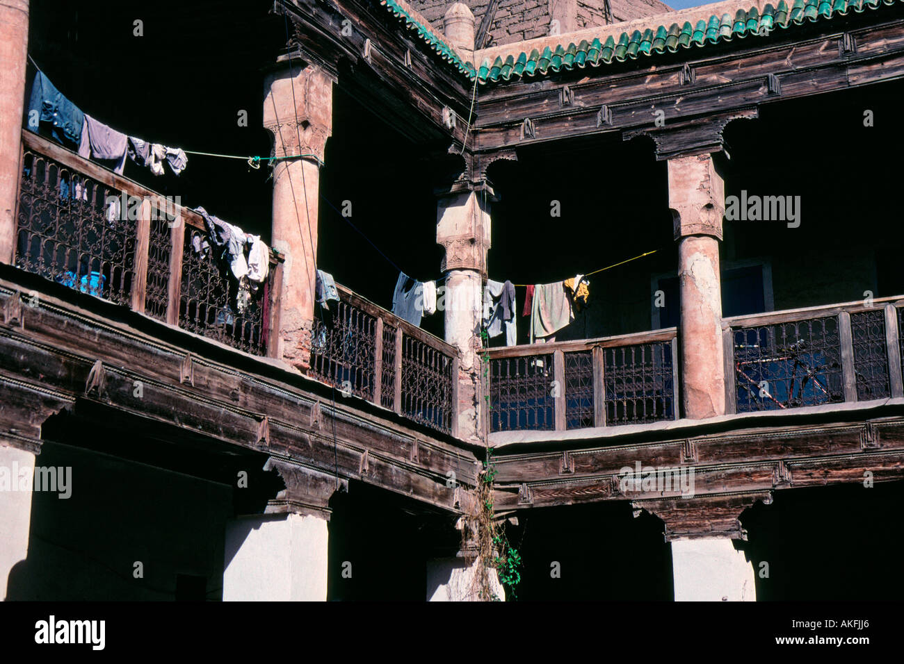 Interior of caravanserai Marrakech Morocco showing timber balconies and ...