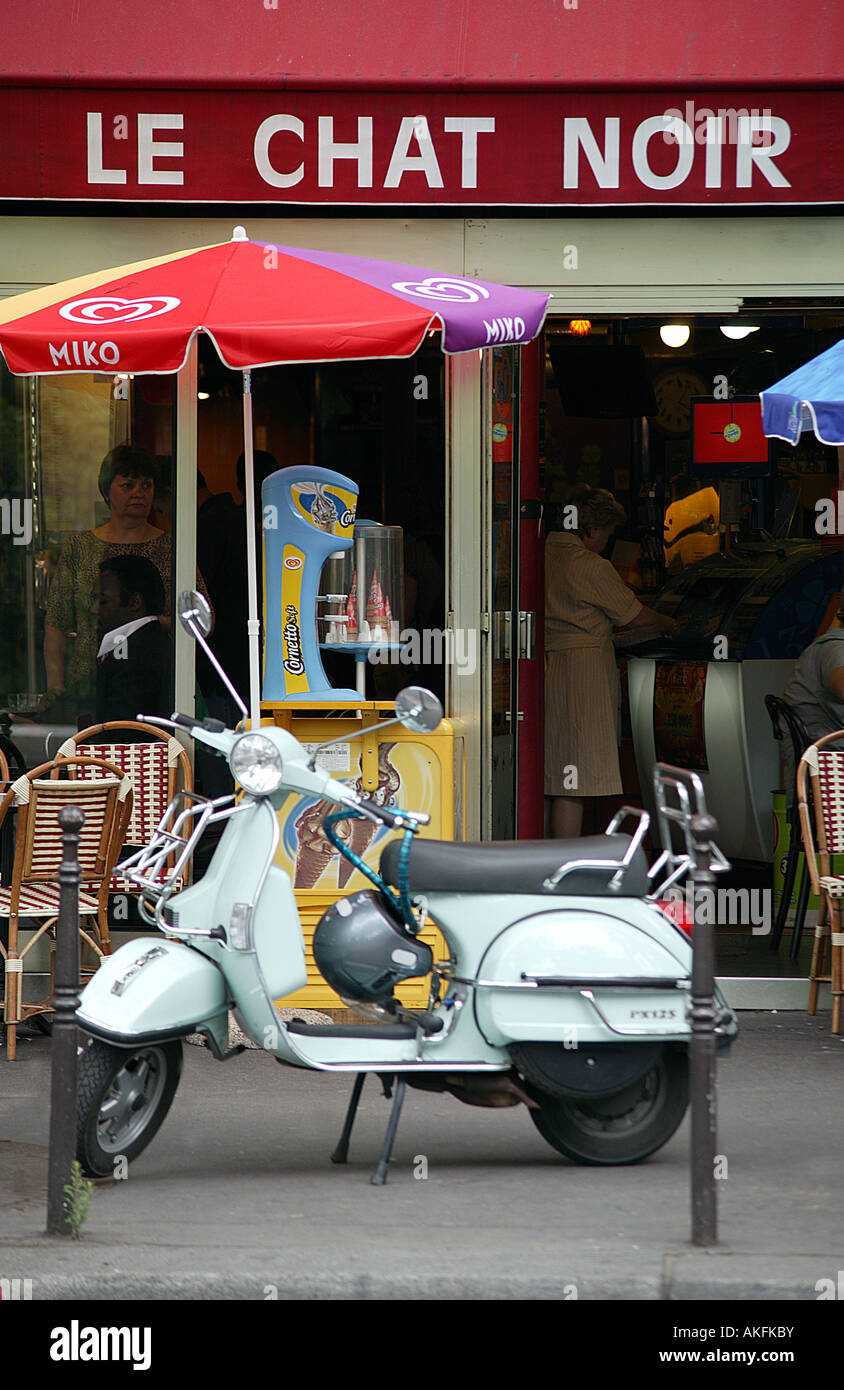 Scooter outside cafe Paris France Stock Photo - Alamy
