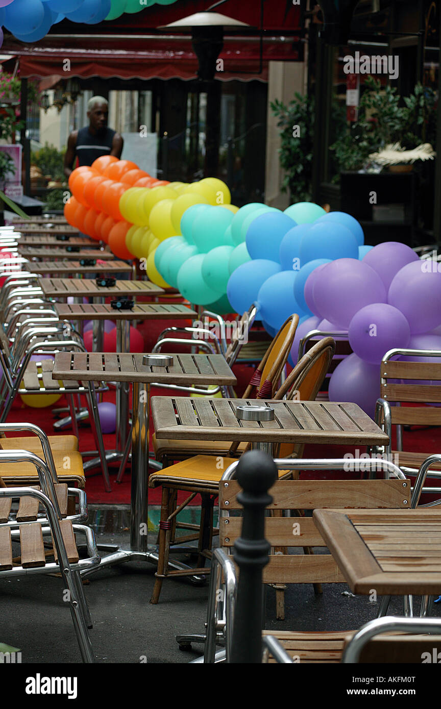 Coloured balloons at cafe in Paris Stock Photo - Alamy