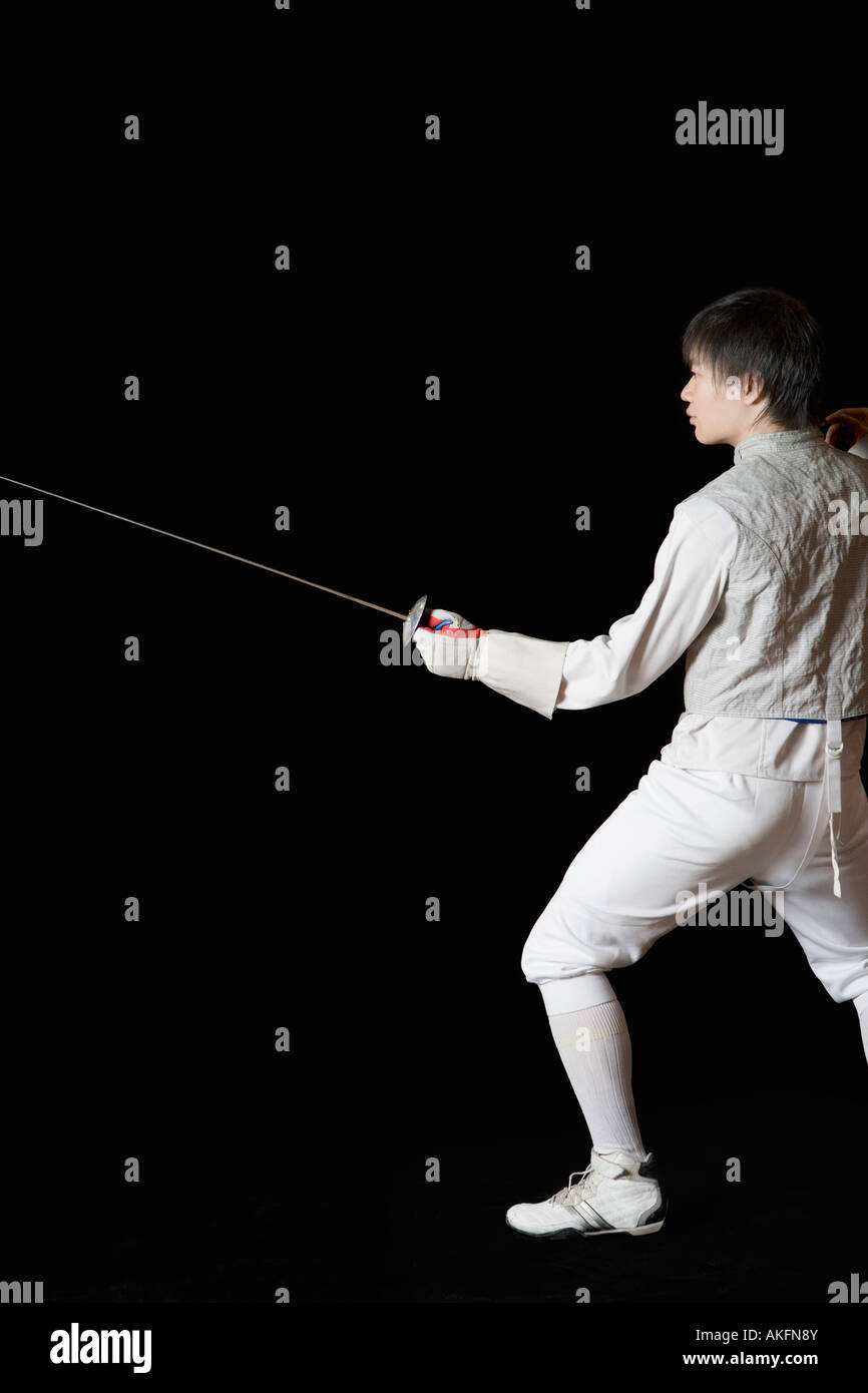 Male Fencer Holding Fencing Foil High Resolution Stock Photography and ...