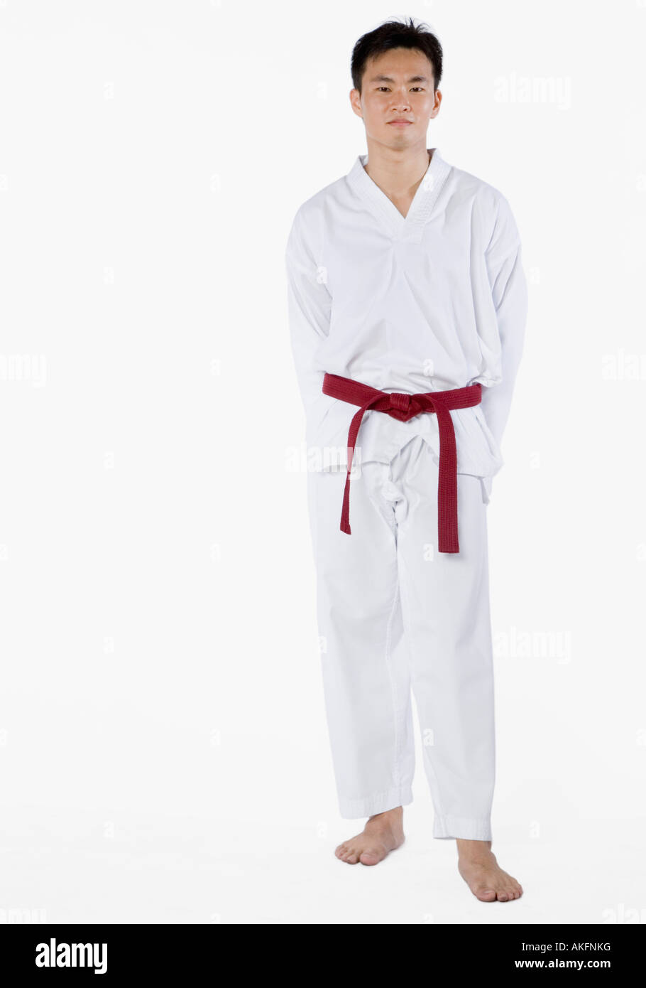 Man hands behind back front view Cut Out Stock Images & Pictures - Alamy