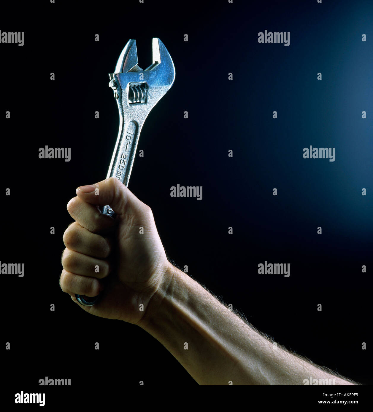 wrench in hand editorial use only Stock Photo - Alamy
