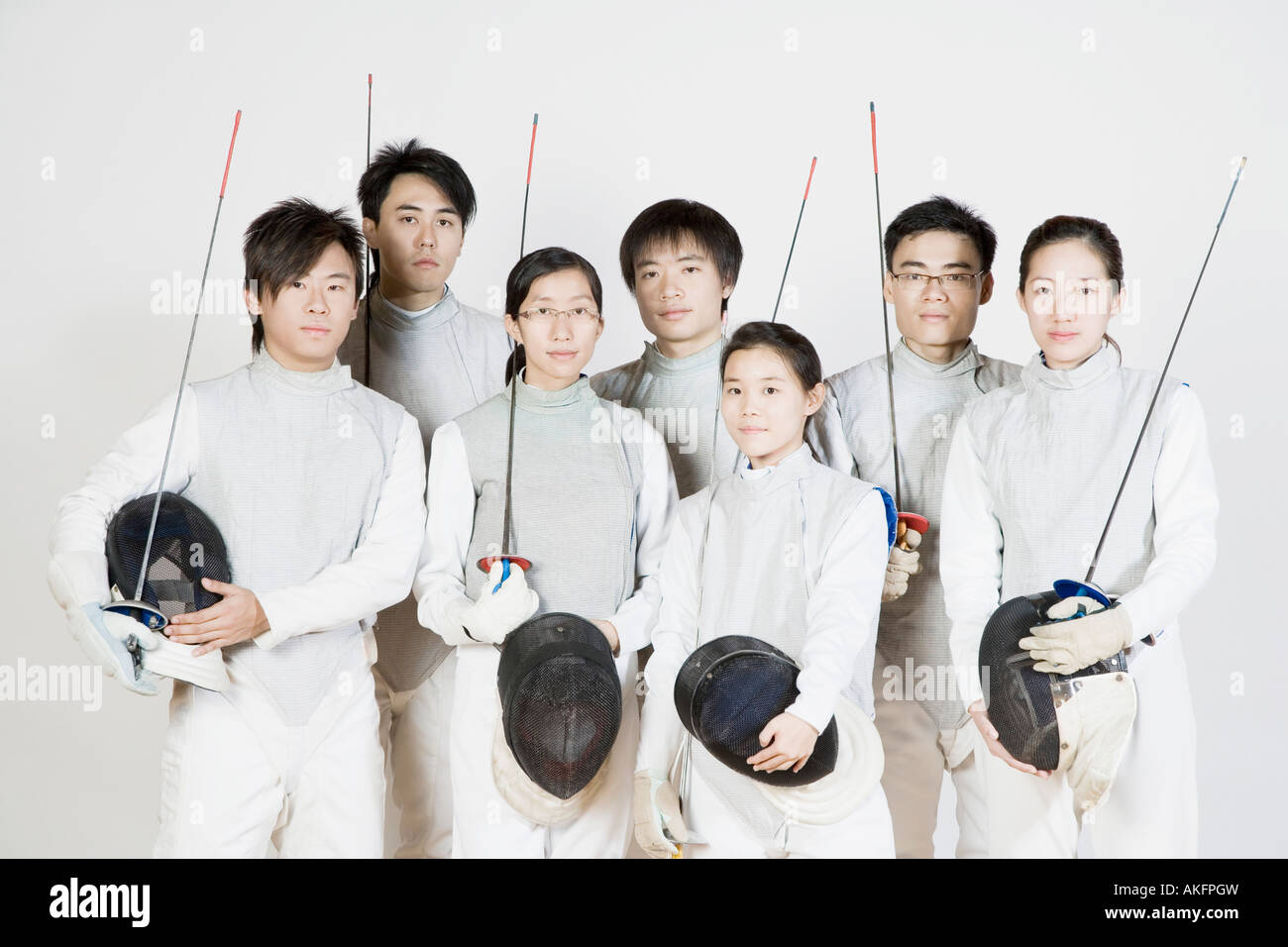 Portrait of a group of fencers standing together Stock Photo - Alamy