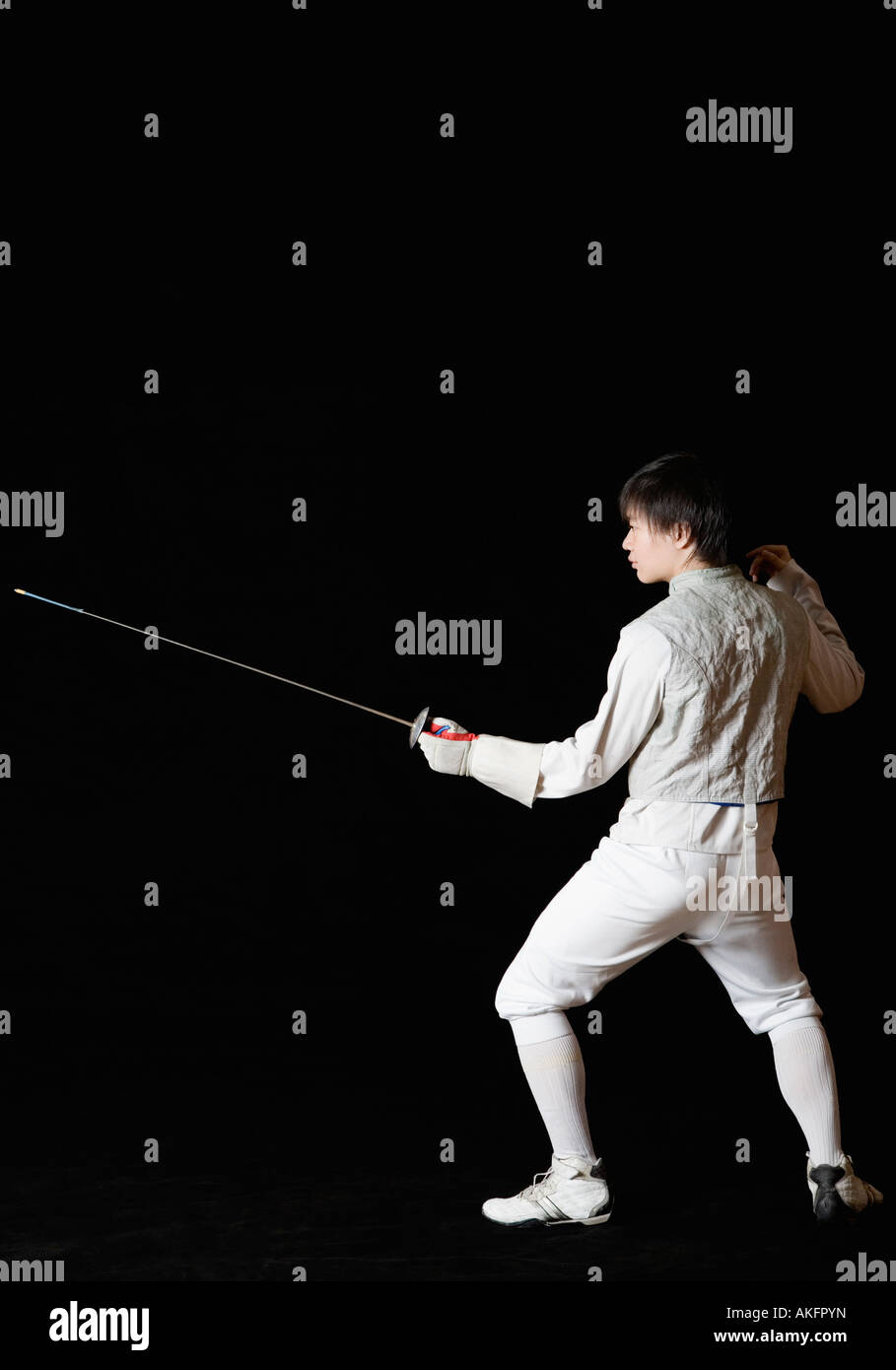 Male fencer holding fencing foil hi-res stock photography and images ...