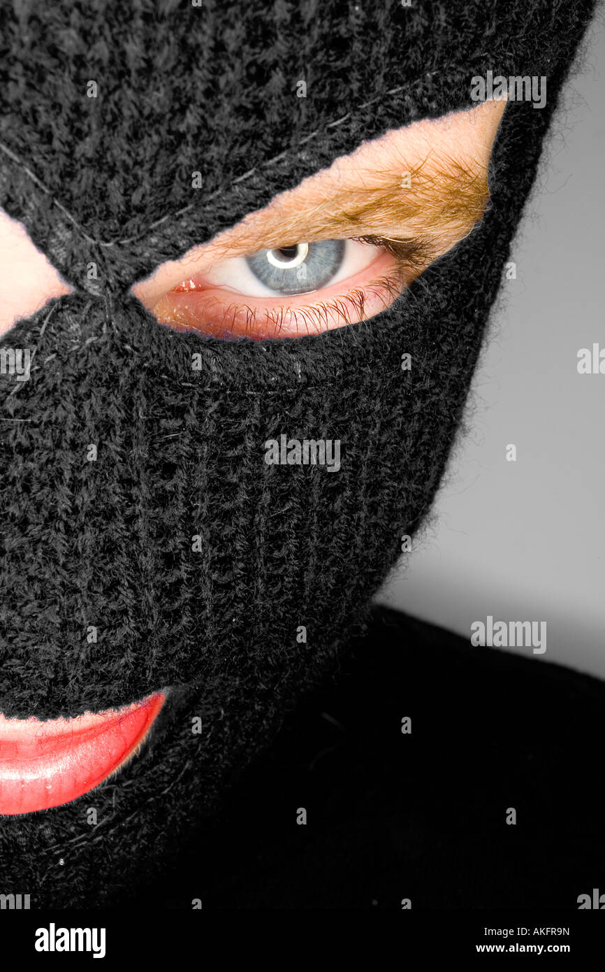 Criminal woman hood evil hi-res stock photography and images - Alamy