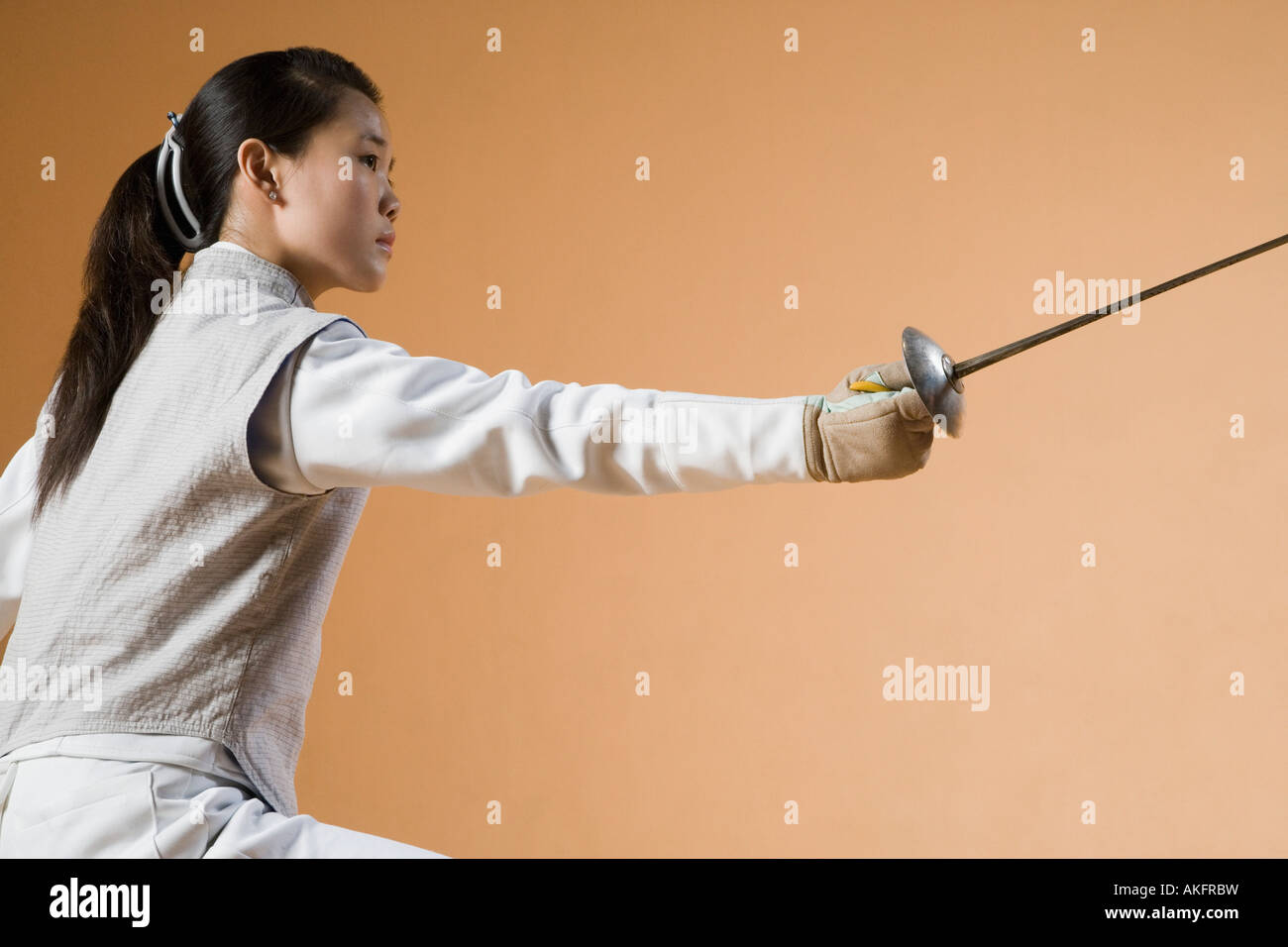 Close up female fencer holding sword hi-res stock photography and images - Alamy