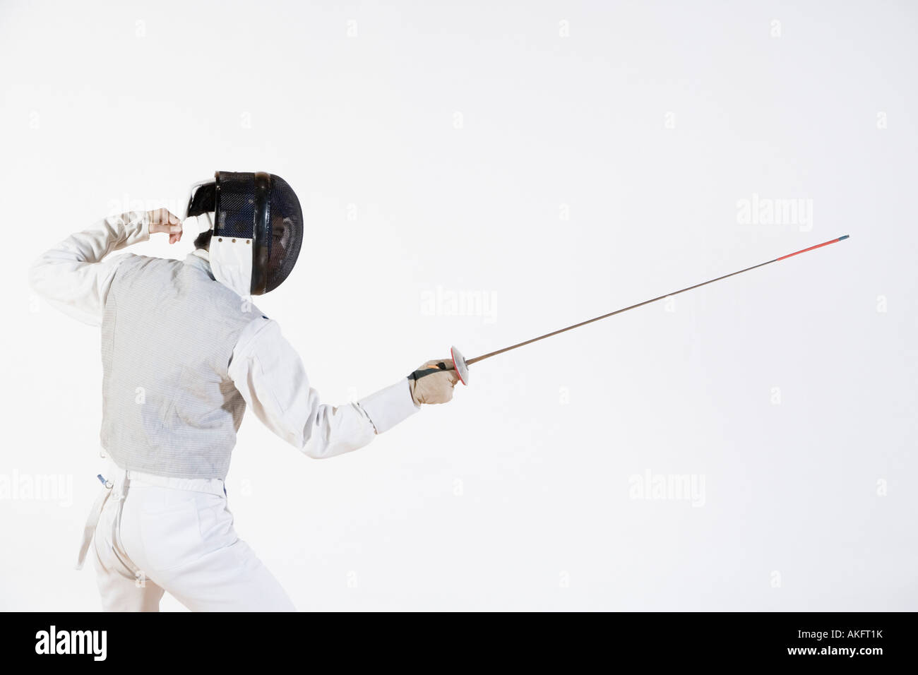 Side profile of a fencer practicing fencing Stock Photo - Alamy