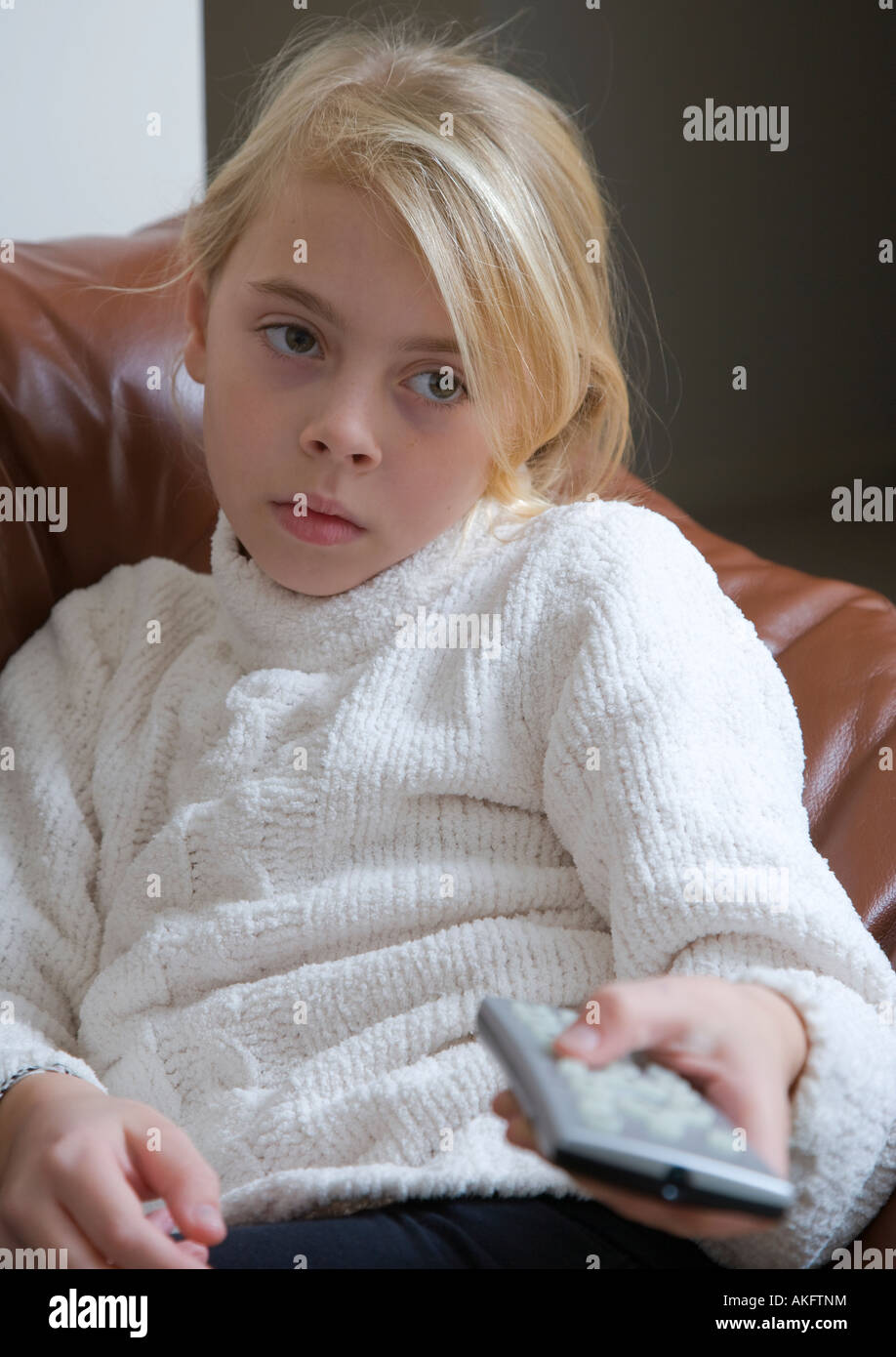 Child bored tv hi-res stock photography and images - Alamy