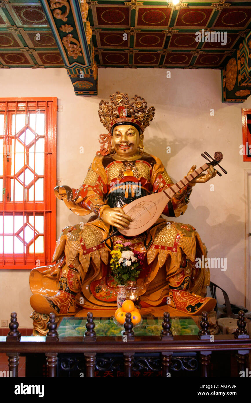 Chinese Buddhist deity with musical instrument, Po Lin Monastery,Lantau ...