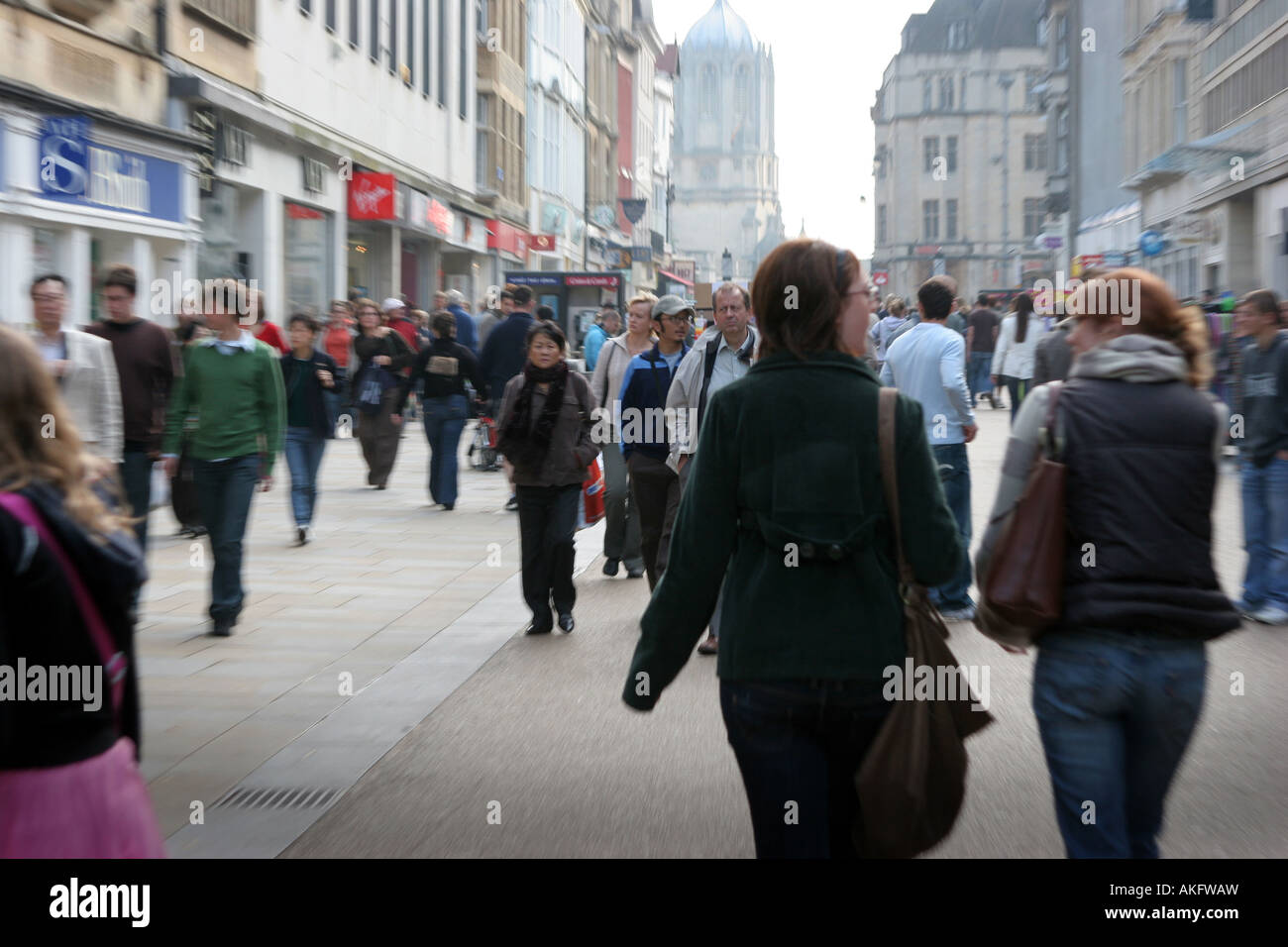 shoppers in a busy town centre high street Stock Photo - Alamy