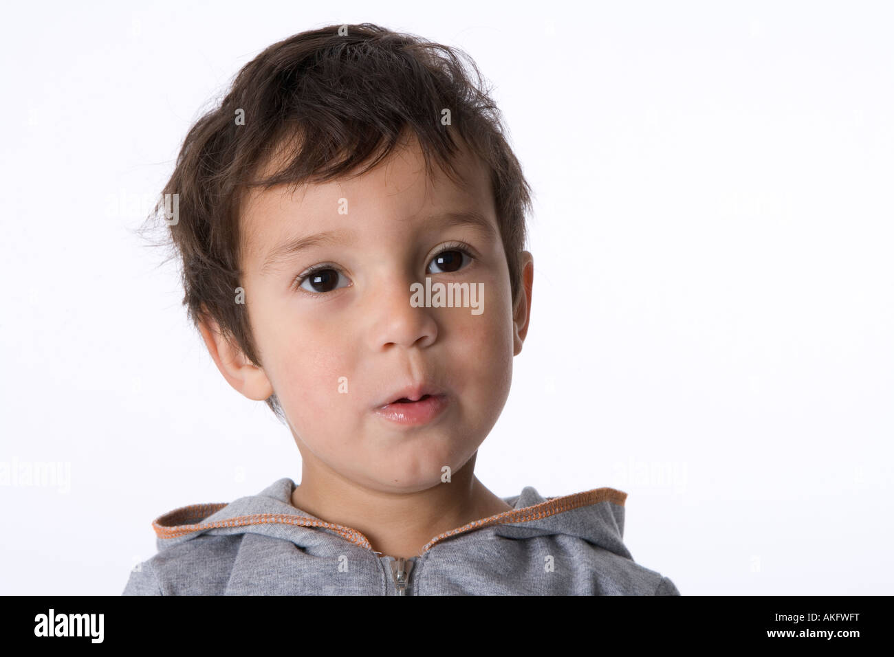 Portrait of a serious little boy Stock Photo - Alamy