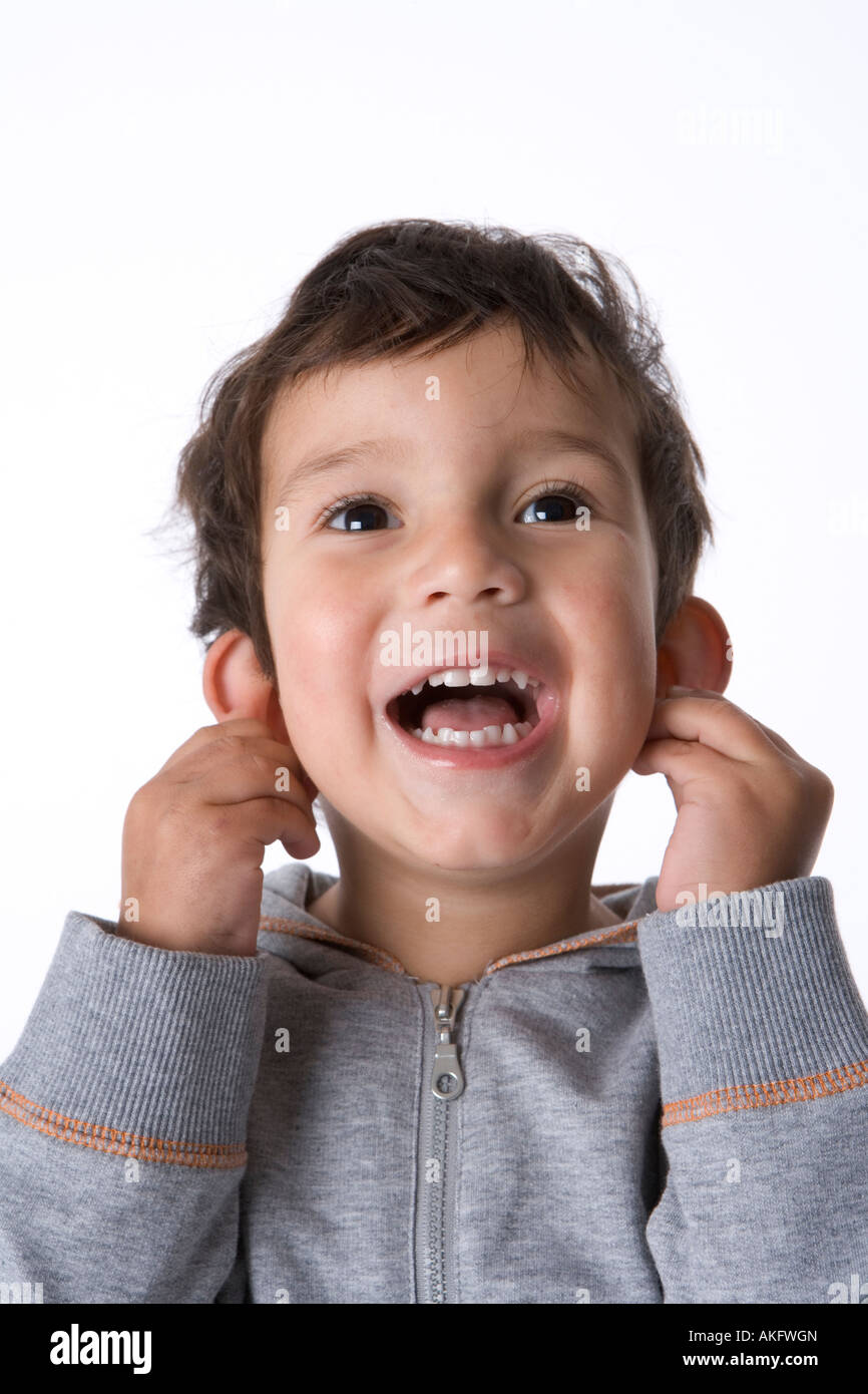 Portrait of a little boy showing his large ears Stock Photo - Alamy