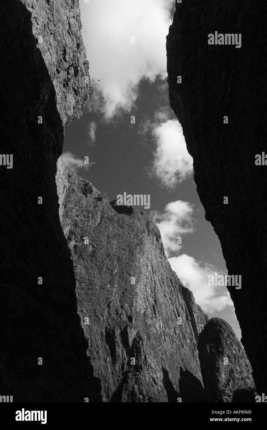 Tall basalt sea cliffs towering hi-res stock photography and images - Alamy