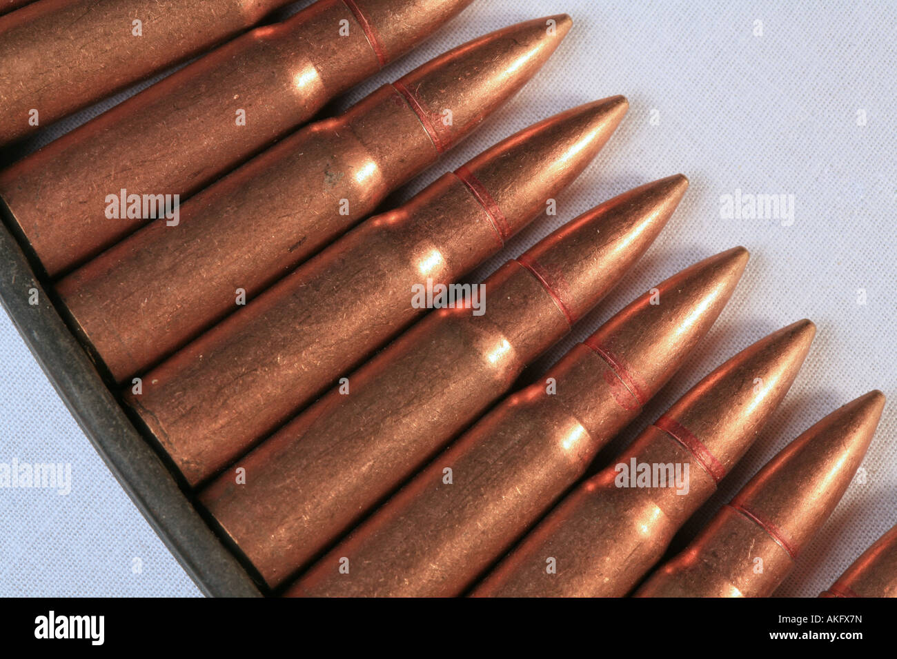 Brass rifle shells isolated on white background Stock Photo - Alamy